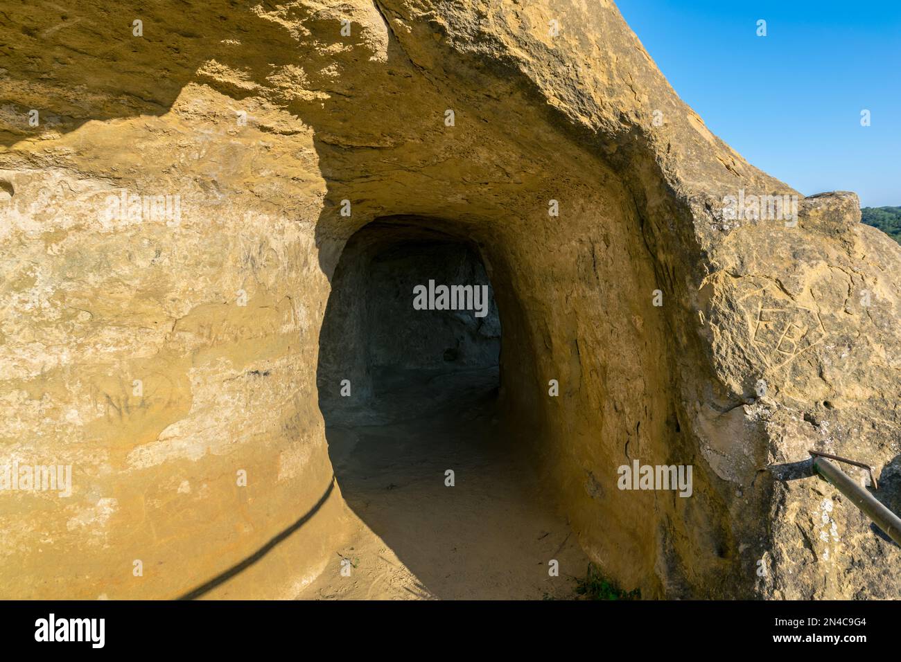 Steep rock wall cave hi-res stock photography and images - Alamy