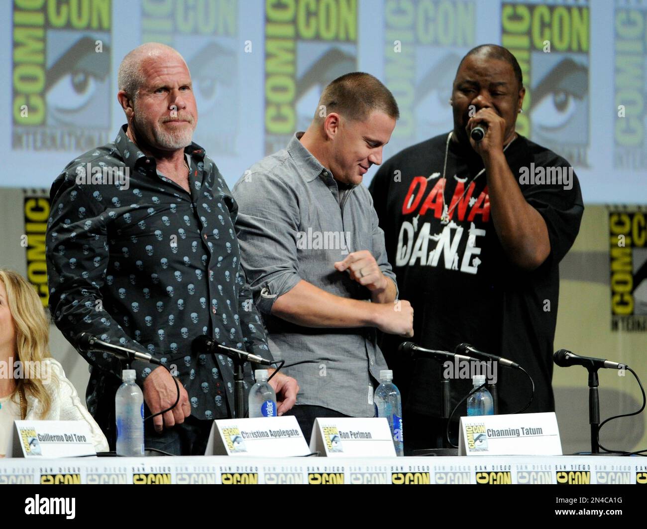 Ron Perlman, left, and Channing Tatum, center, dance as Biz Markie ...