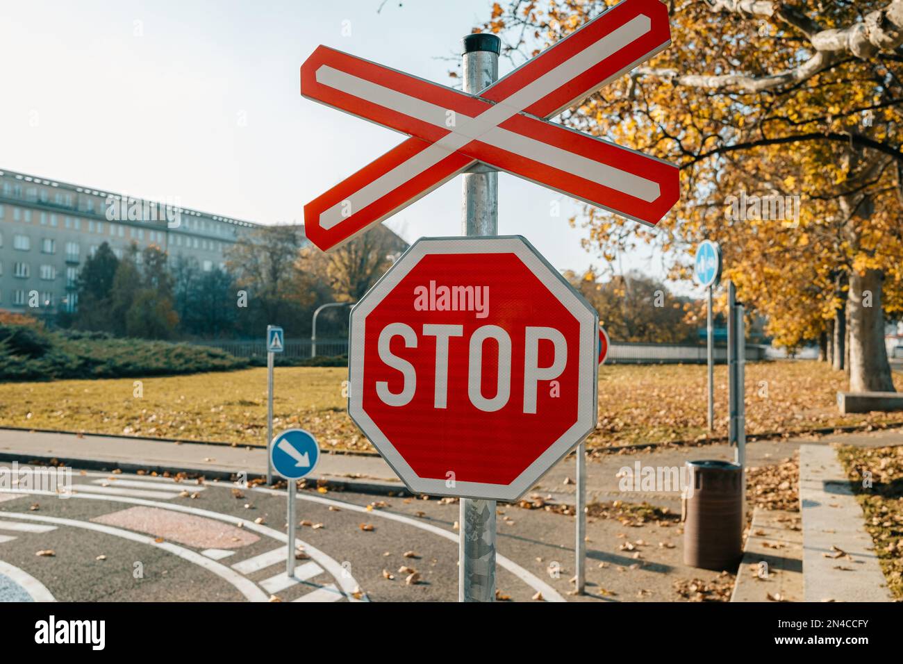 Stop red sign on autumn city background. Traffic signal Stock Photo - Alamy