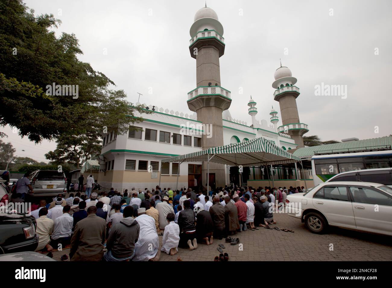 Kenyan Muslims pray outside the masjid at the Noor Masjid on the last ...