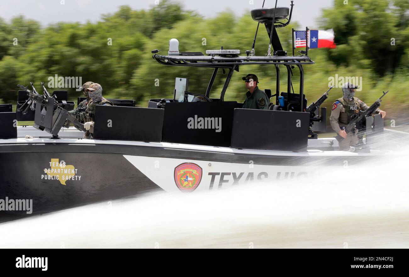 Texas Department of Safety Troopers patrol on the Rio Grande along the ...