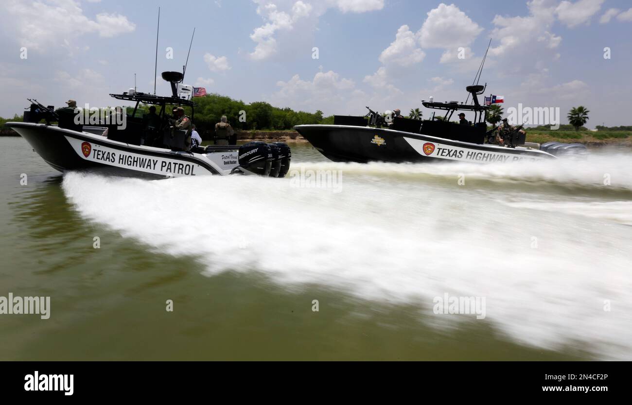 Texas Department of Safety Troopers patrol on the Rio Grande along the ...