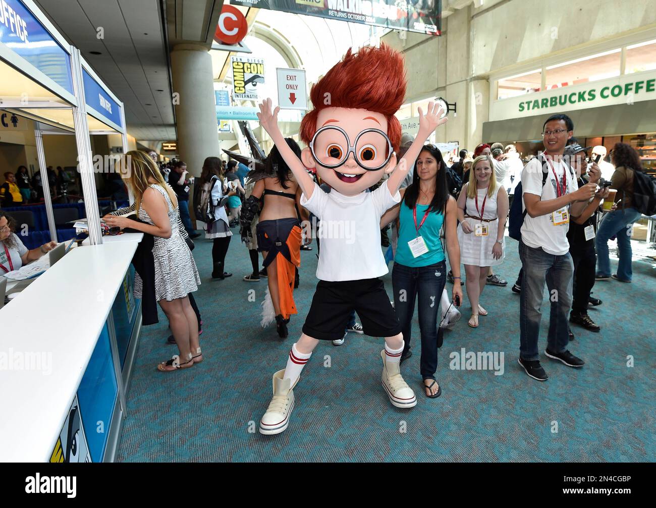An actor dressed as Sherman from the movie Mr. Peabody and Sherman ...