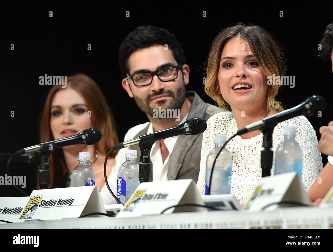 From left, Holland Roden, Tyler Hoechlin and Shelley Hennig attend the ...