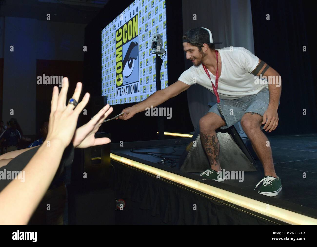 Tyler Posey signs autographs at the "Teen Wolf" panel at Comic-Con ...