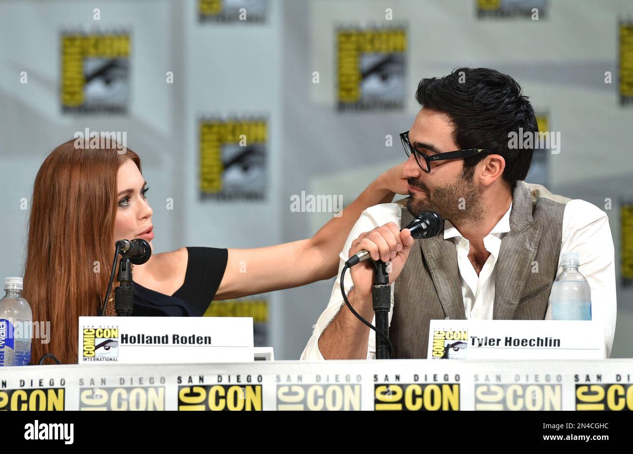 Holland Roden, left, and Tyler Hoechlin attend the "Teen Wolf" panel at ...