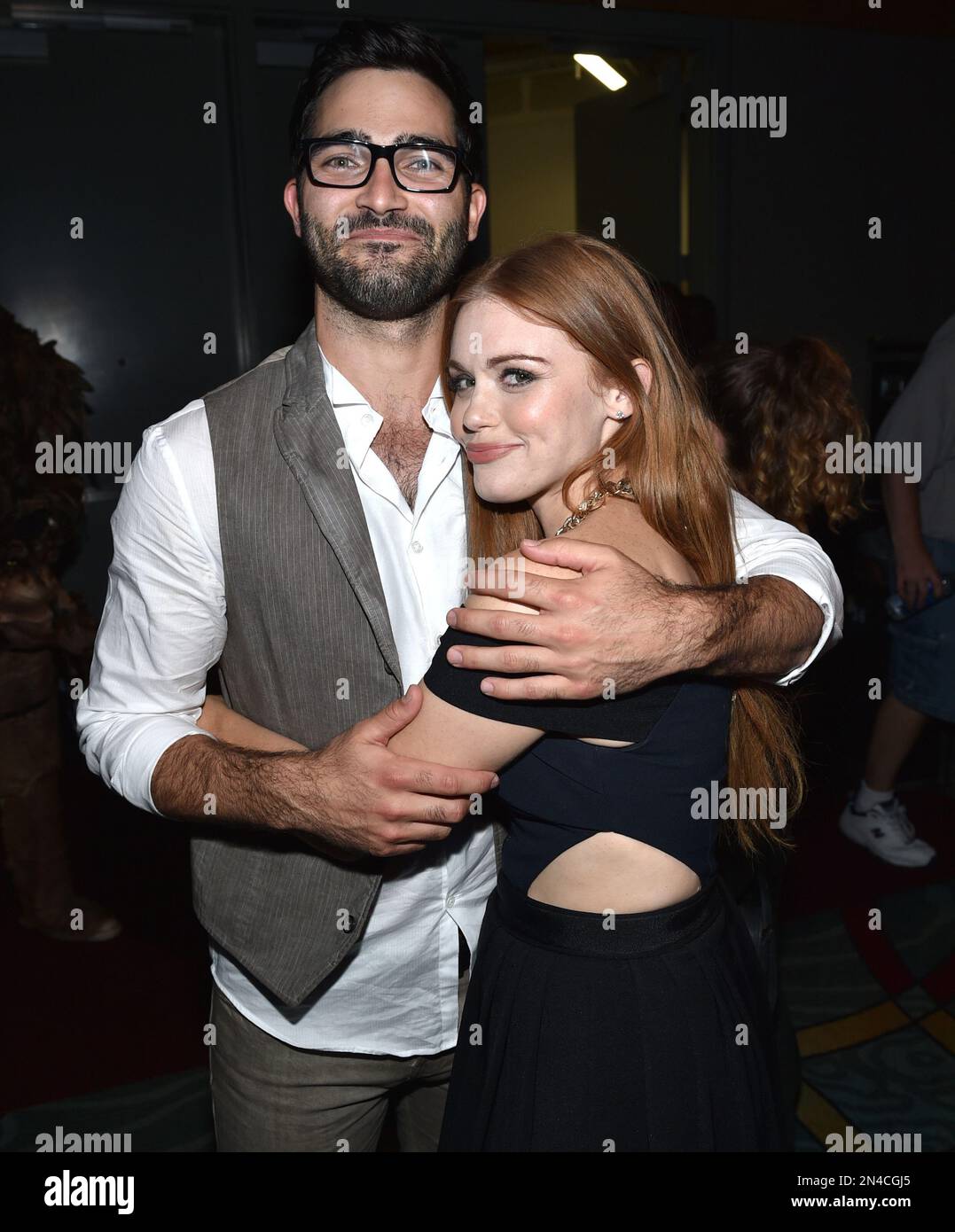EXCLUSIVE - Tyler Hoechlin, left, and Holland Roden pose backstage at ...