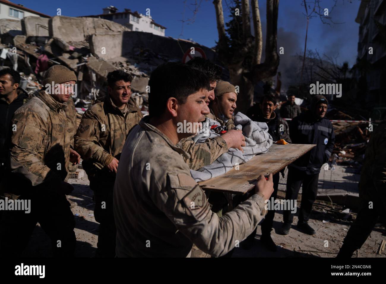 Hatay, Turkey. 08th Feb, 2023. Soldiers carry a 20-day-old baby who was ...