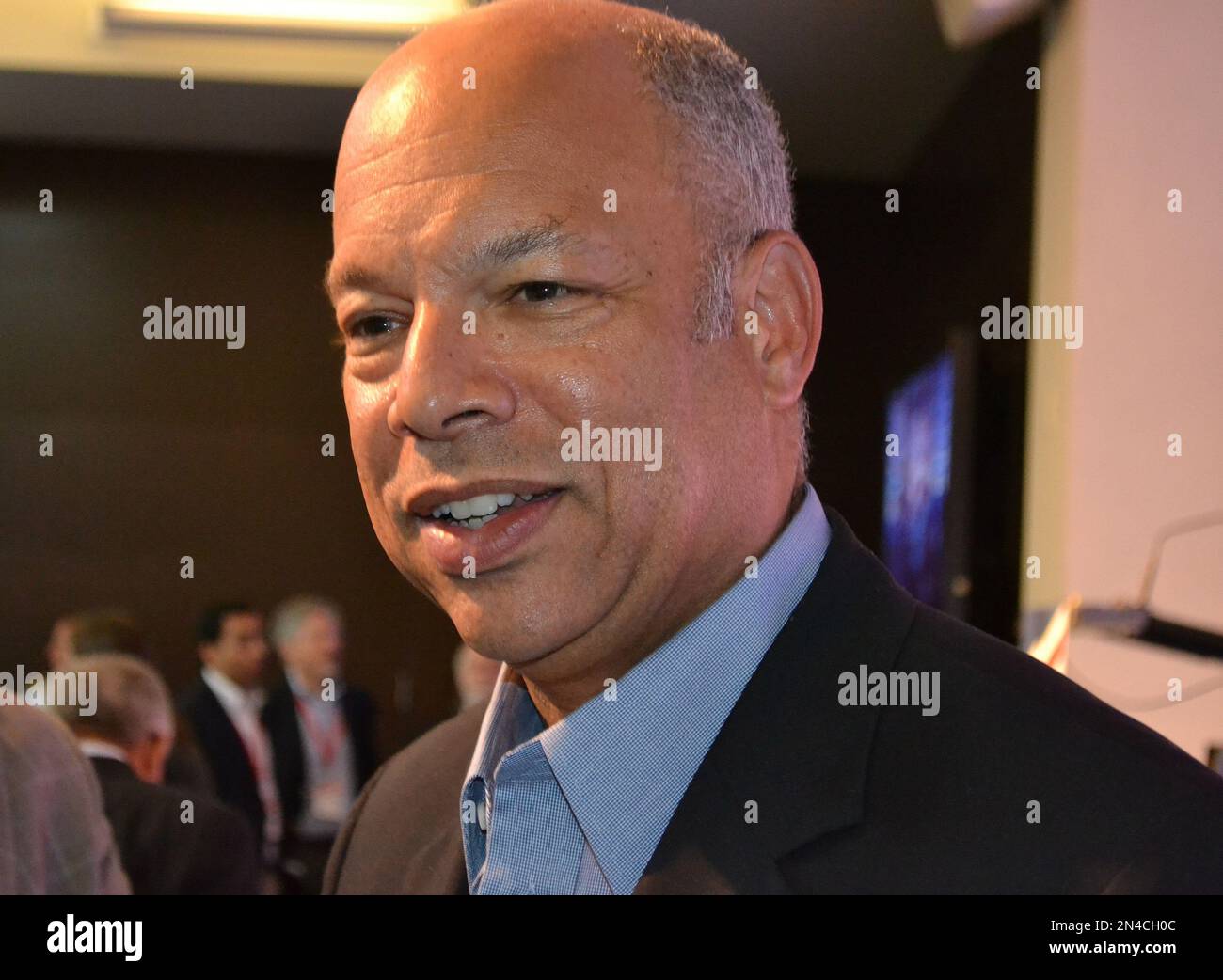 Jeh Johnson, United States Secretary of Homeland Security, talks with ...