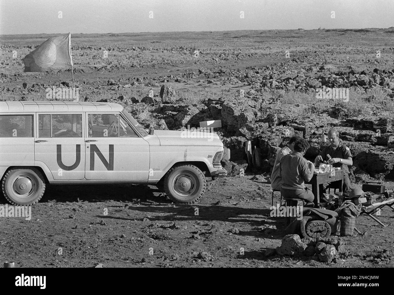 United Nations observers have dinner at an observation post about one ...