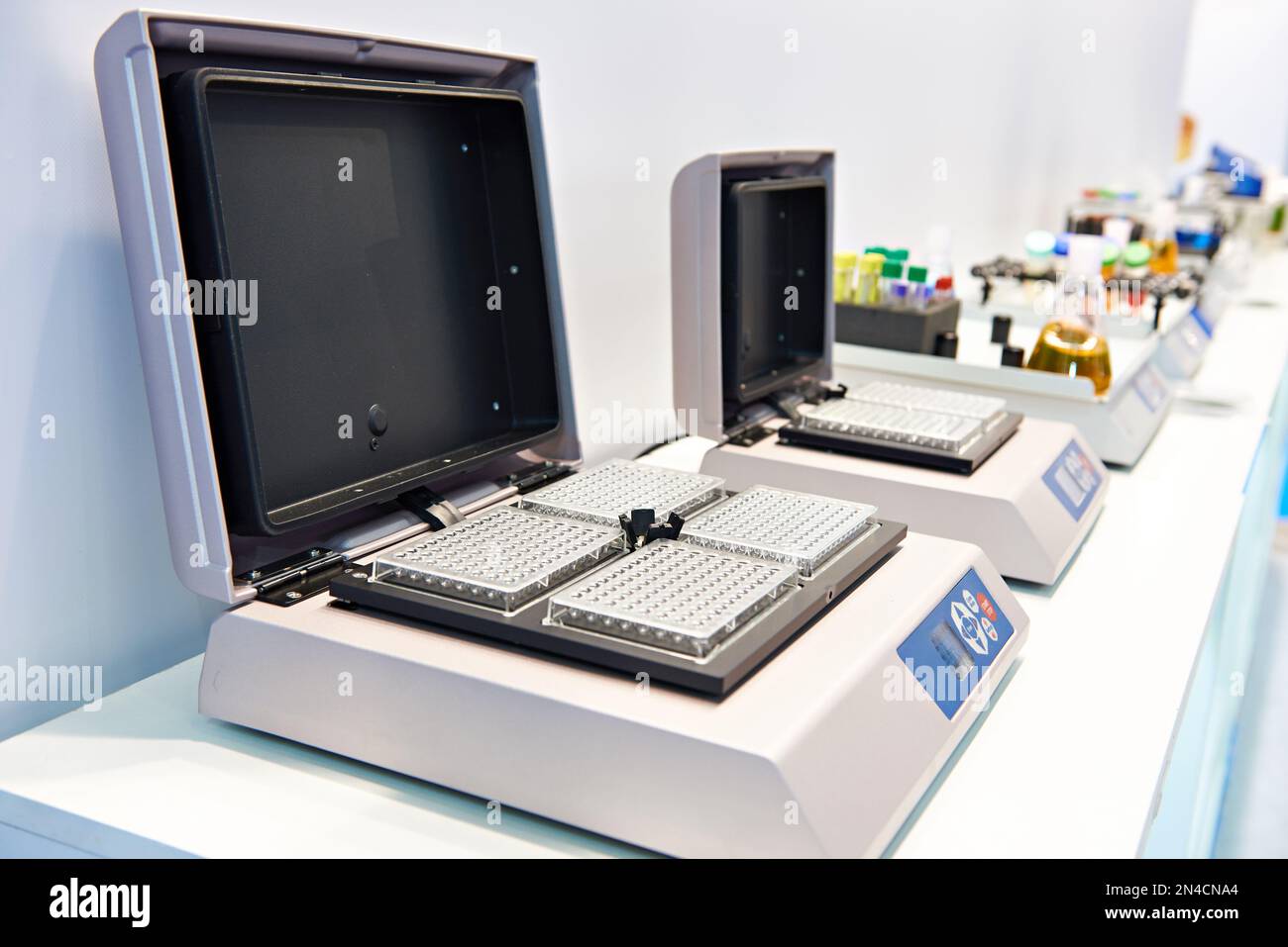 Linear shaker for chemical laboratory with samples Stock Photo - Alamy