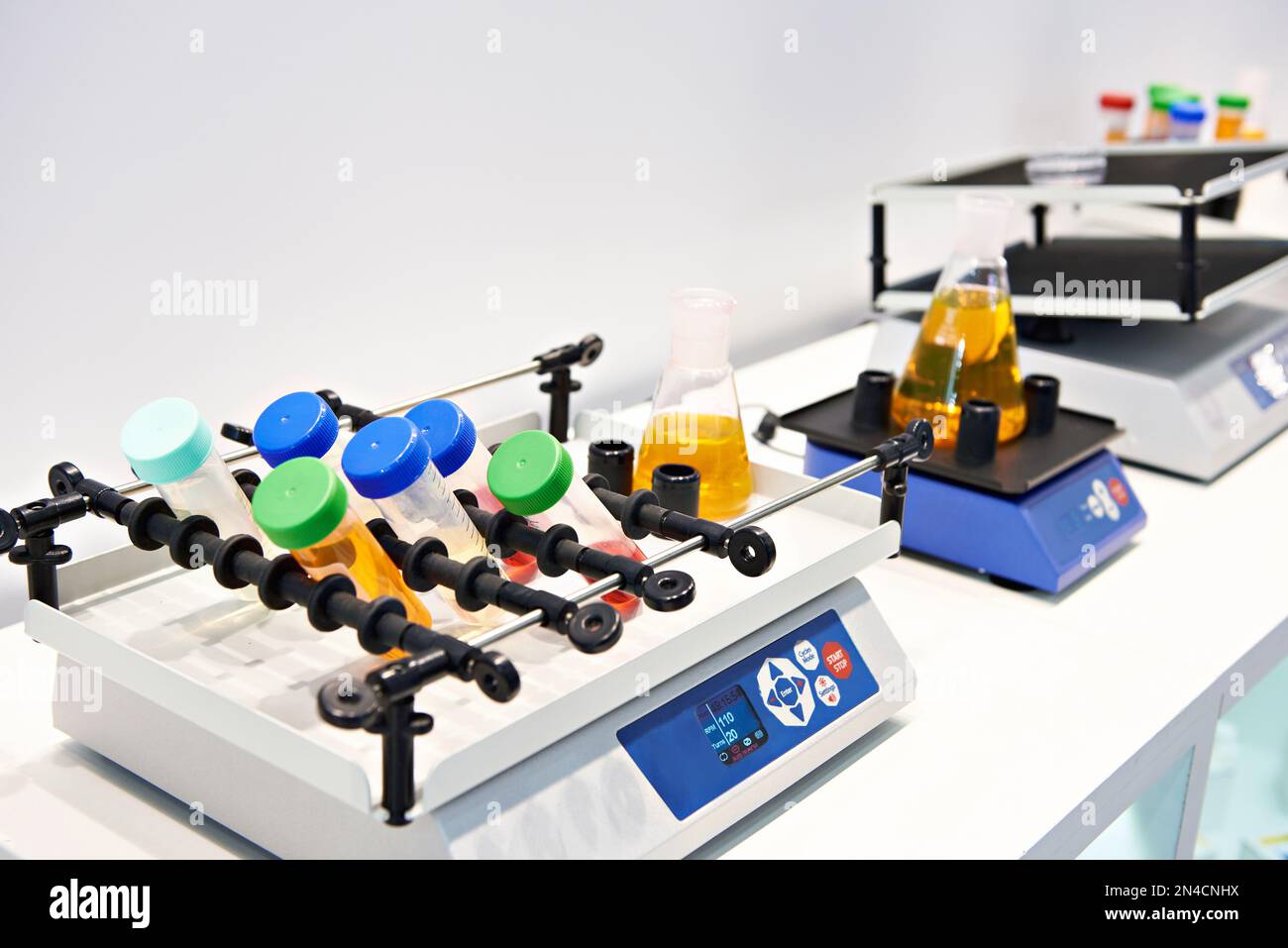 Orbital shaker for chemical laboratory with samples Stock Photo - Alamy