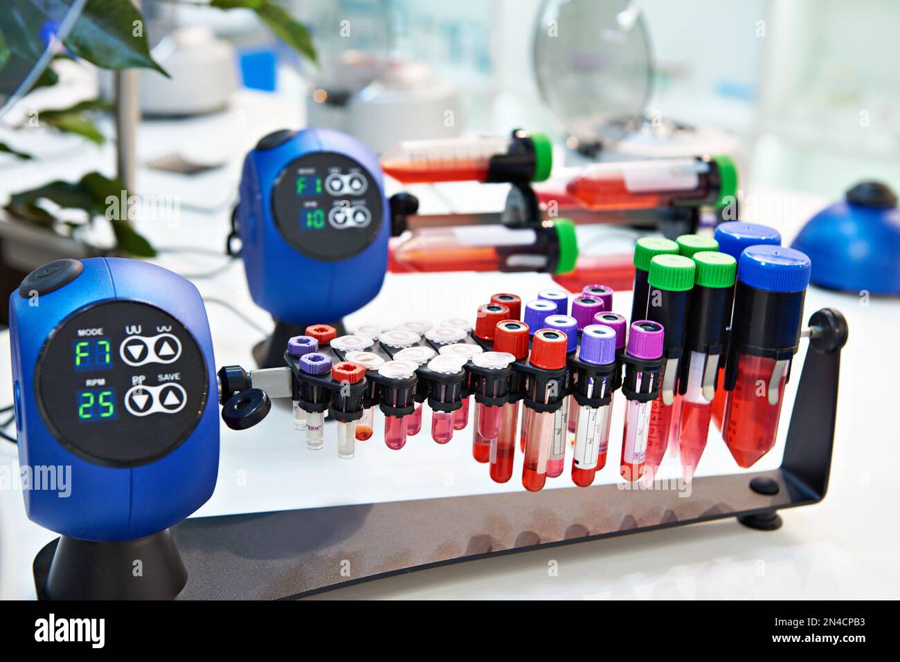 Rotary medical mixer on lab Stock Photo - Alamy