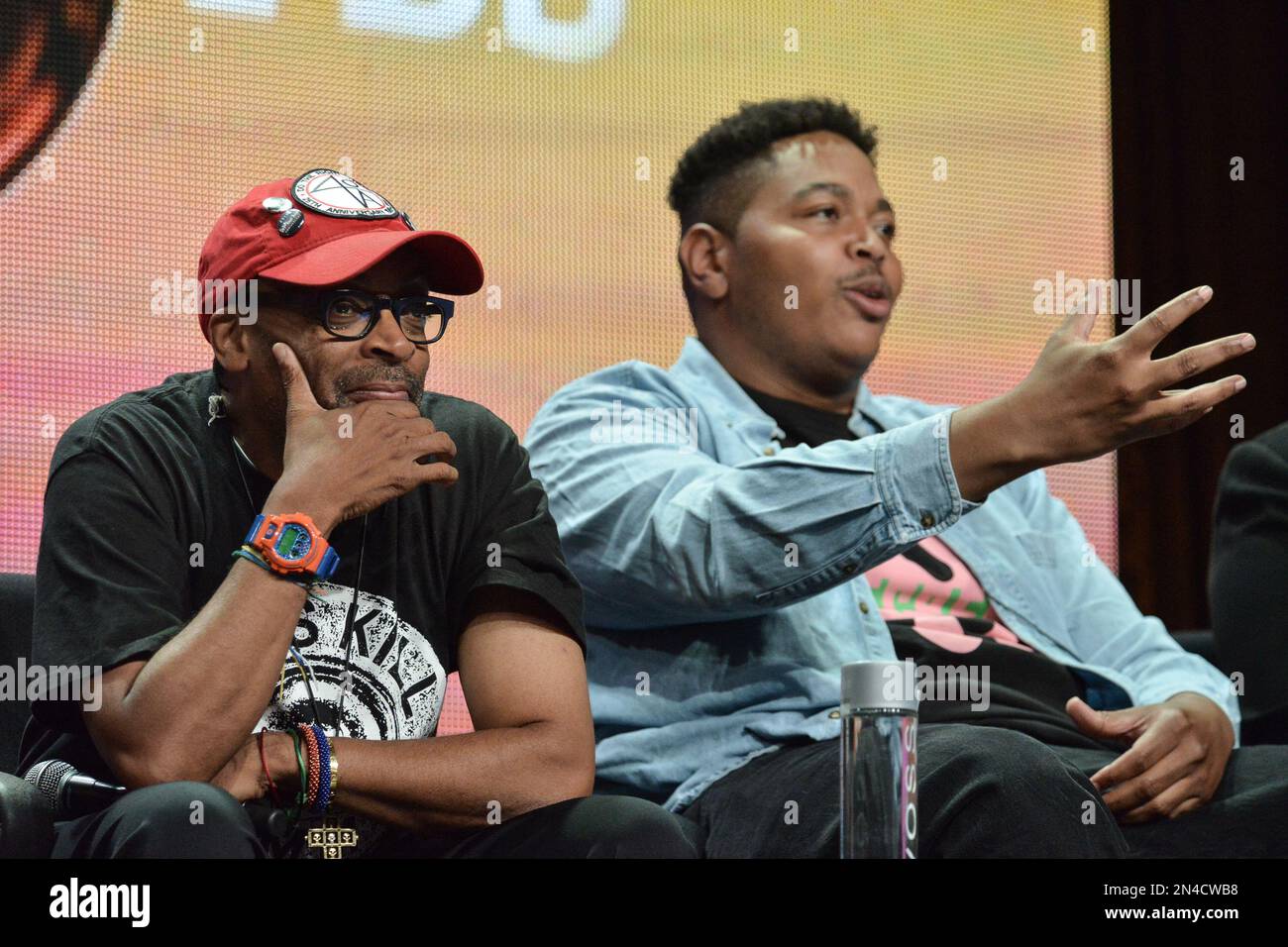 Spike Lee, left, and Darius Monroe speak on stage during the ...