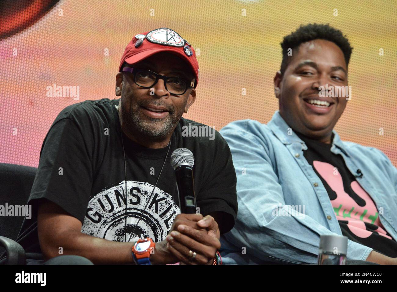 Spike Lee, left, and Darius Monroe speak on stage during the ...