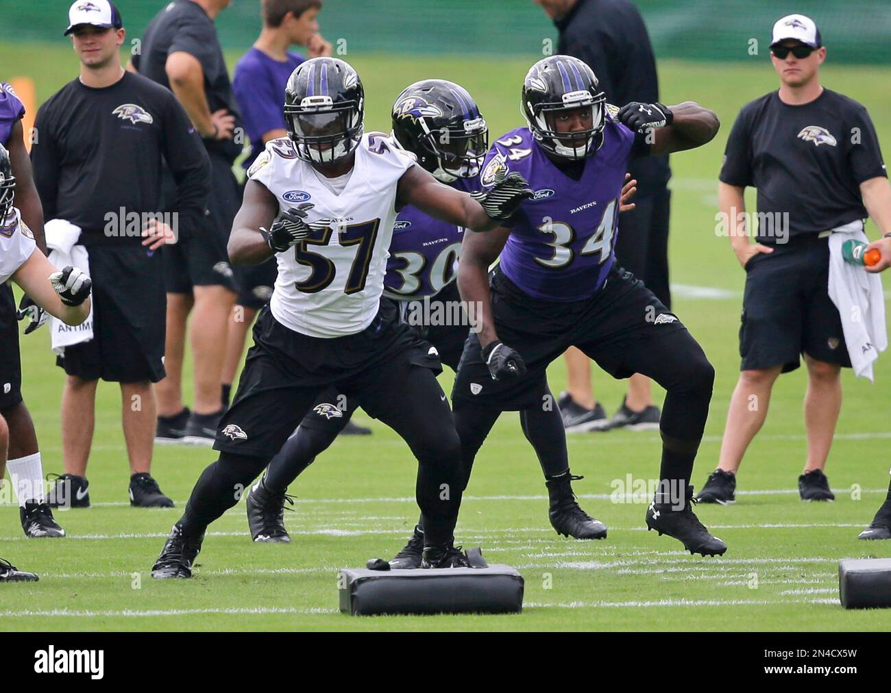 Baltimore Ravens linebacker C.J. Mosley (57) runs a drill alongside ...