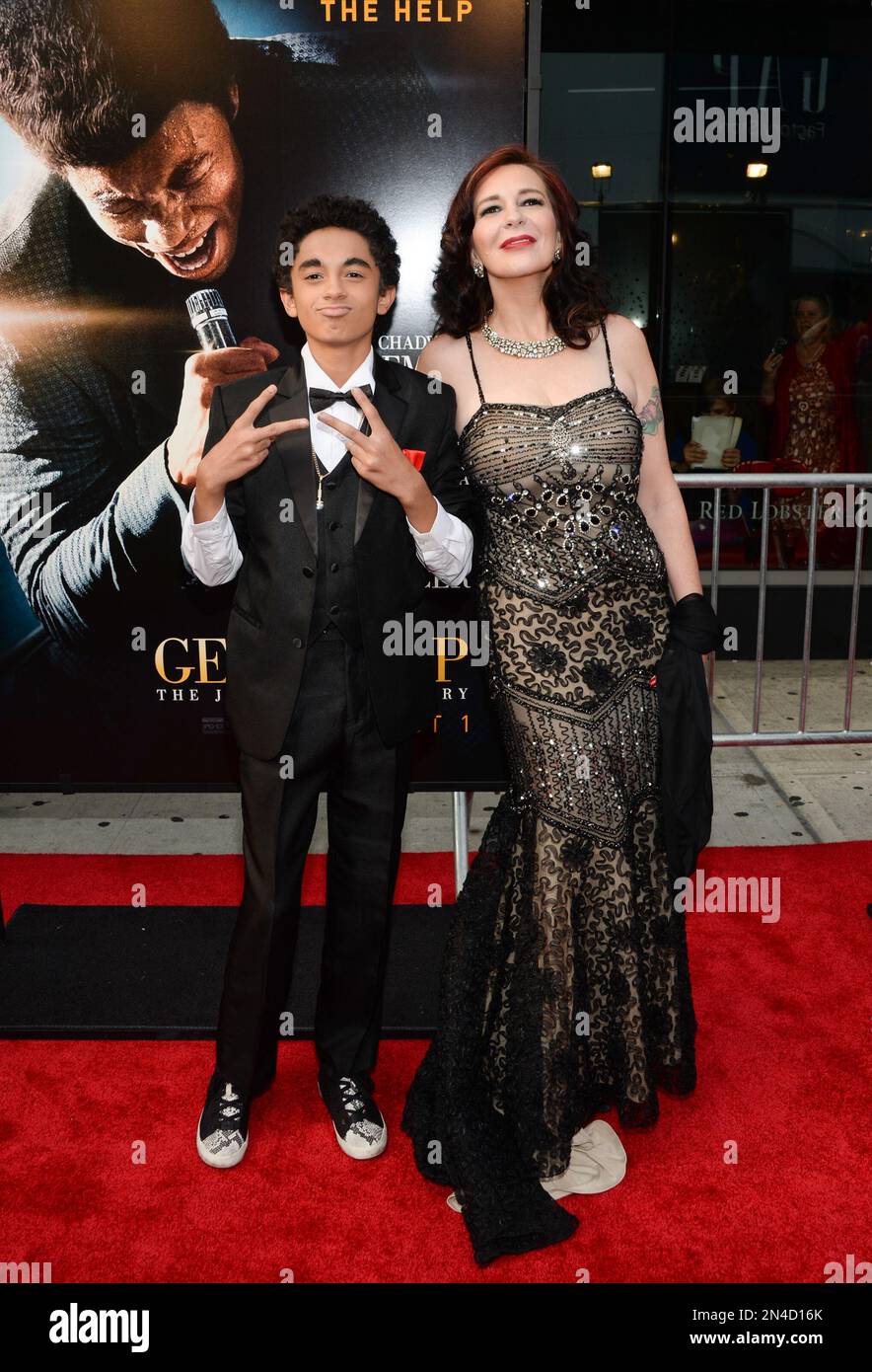 James Brown's companion Tomi Rae Hynie, right, and his son James Brown ...