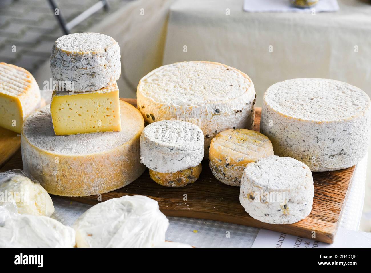Different types of cheeses sold in the market Stock Photo - Alamy
