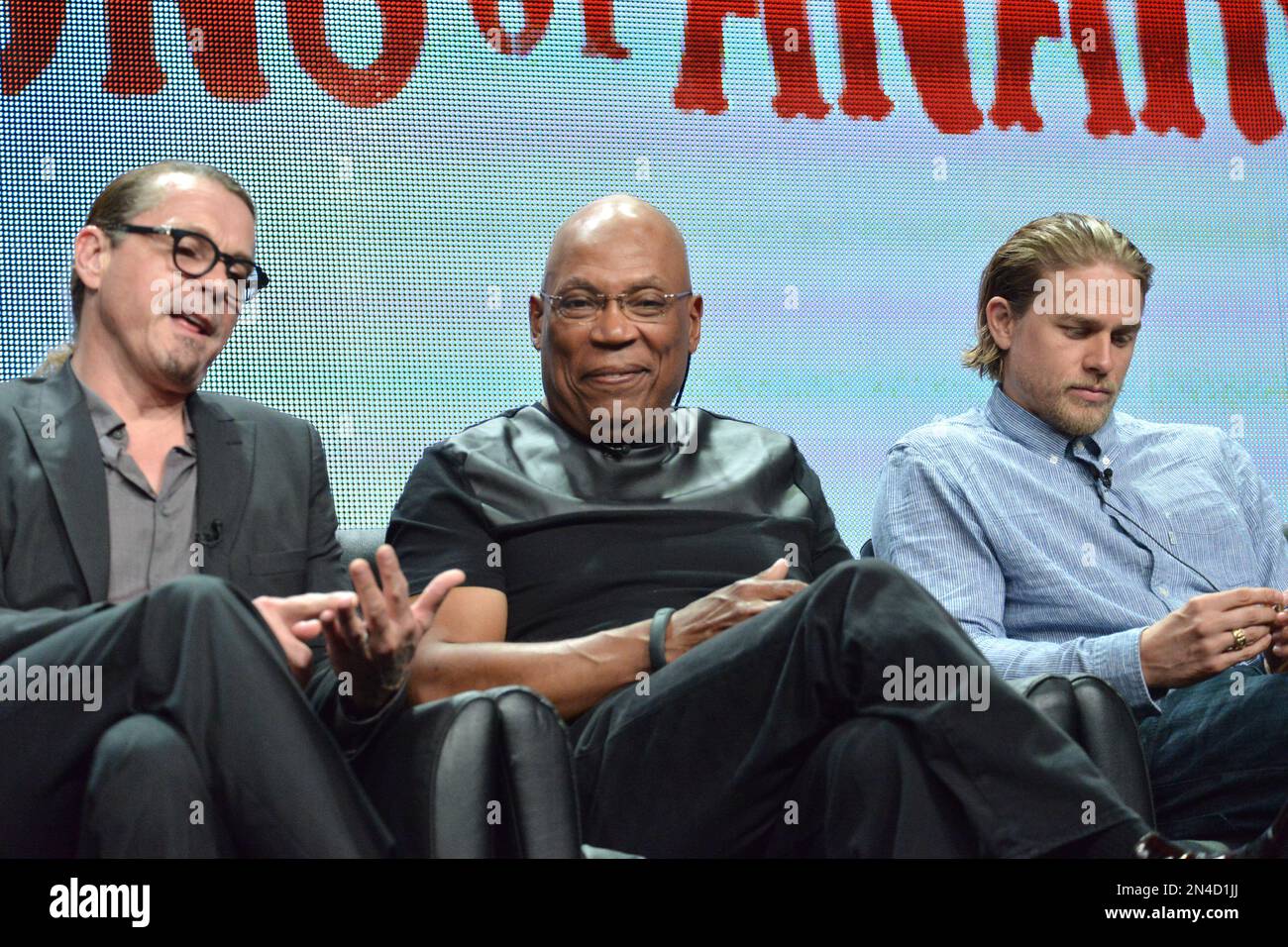 From left, creator Kurt Sutter, director Paris Barclay and Charlie Hunnam on stage during the ...