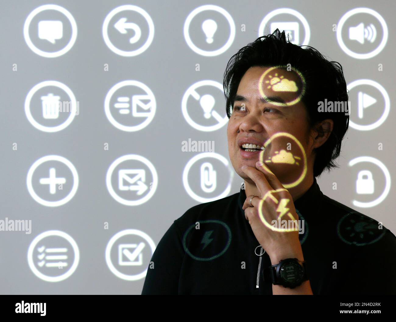 In this photo taken July 3, 2014, Albert Shum, who heads interaction ...