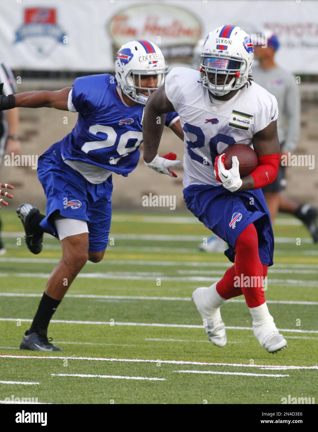 Buffalo Bills running back Anthony Dixon (26) runs past corner back ...