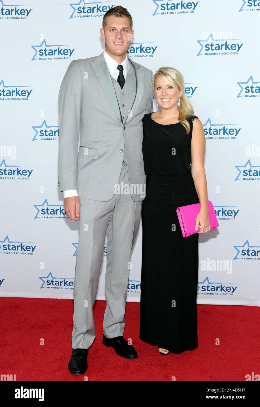 New York Knicks' Cole Aldrich with wife Britt are seen on the red ...