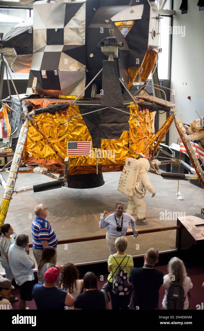 Visitors listen to Smithsonian volunteer Pamela A. Neal, center, speak ...