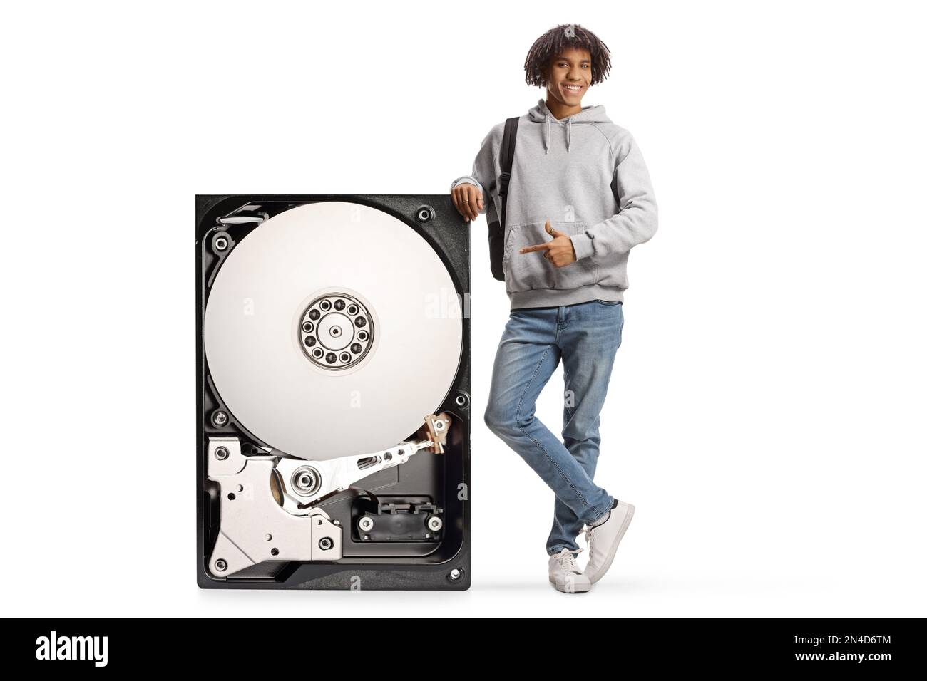 African american man pointing at a big hard disk isolated on white ...