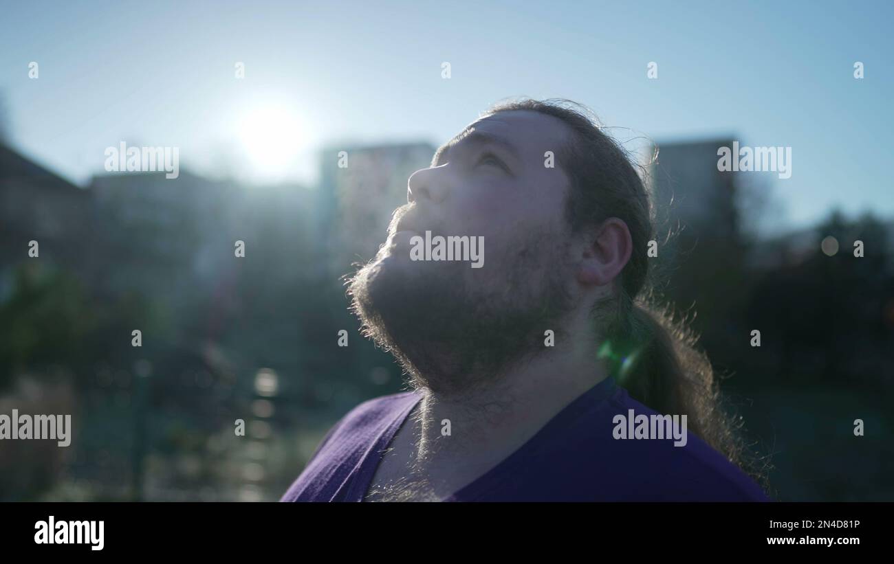 One hopeful overweight man standing hi-res stock photography and images ...