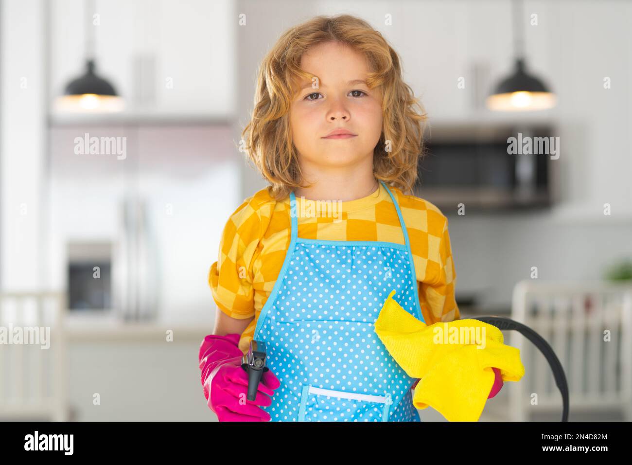 Children helping with housekeeping, cleaning the house. Housekeeping at ...