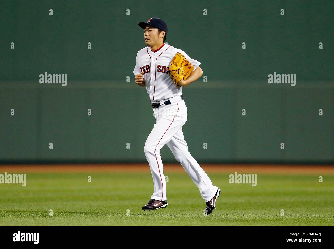 Boston Red Sox's Koji Uehara comes in to pitch during the ninth inning ...