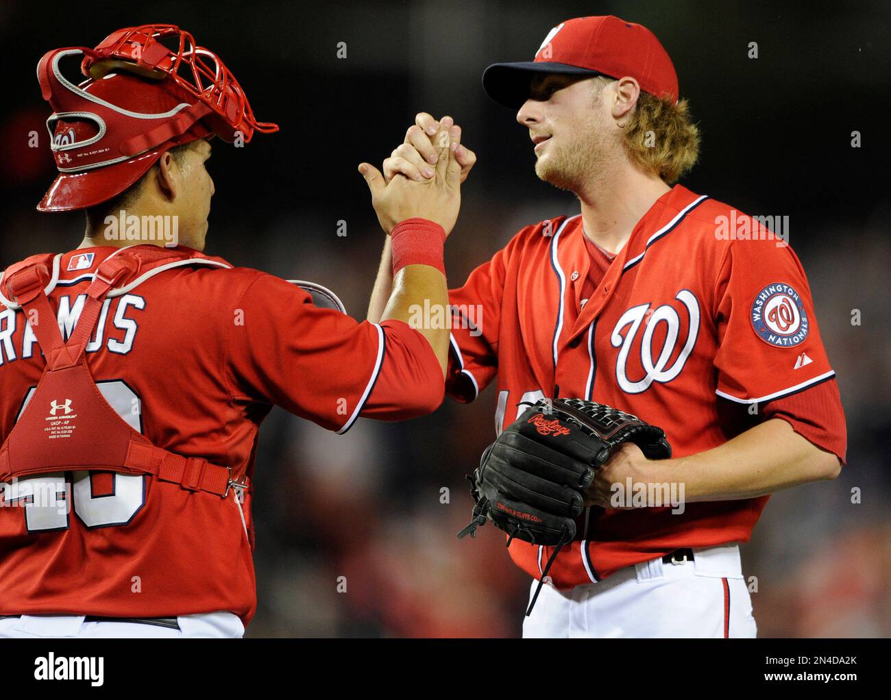 Washington Nationals relief pitcher Ross Detwiler, right, celebrates ...