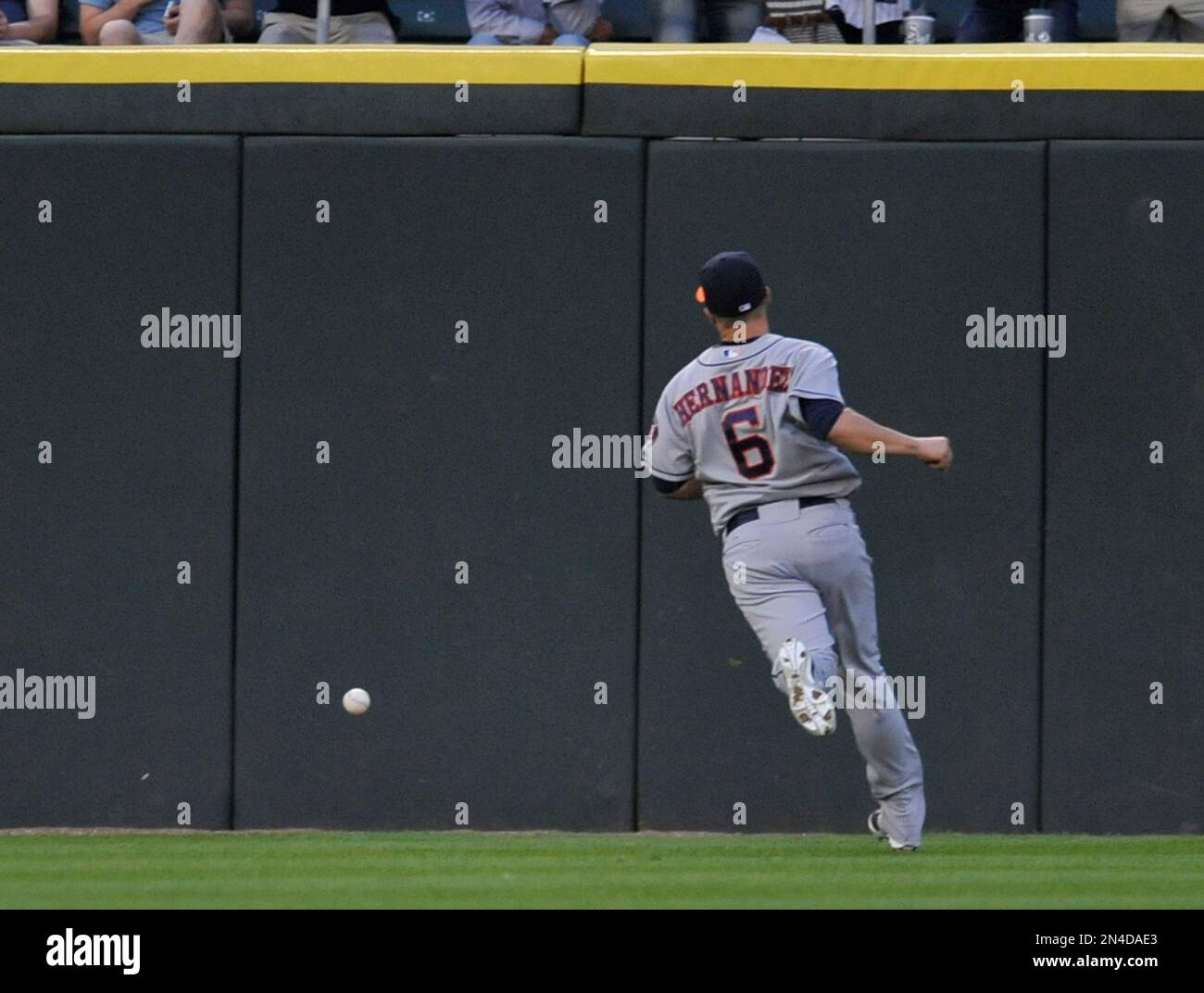 Houston Astros left fielder Enrique Hernandez chases down an RBI double ...