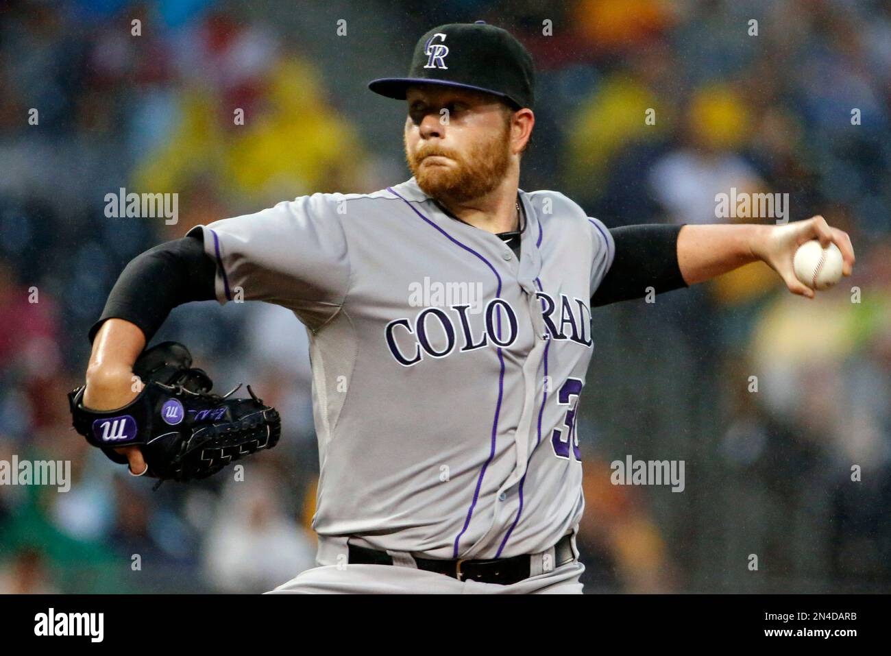 Colorado Rockies starting pitcher Brett Anderson (30) delivers during ...