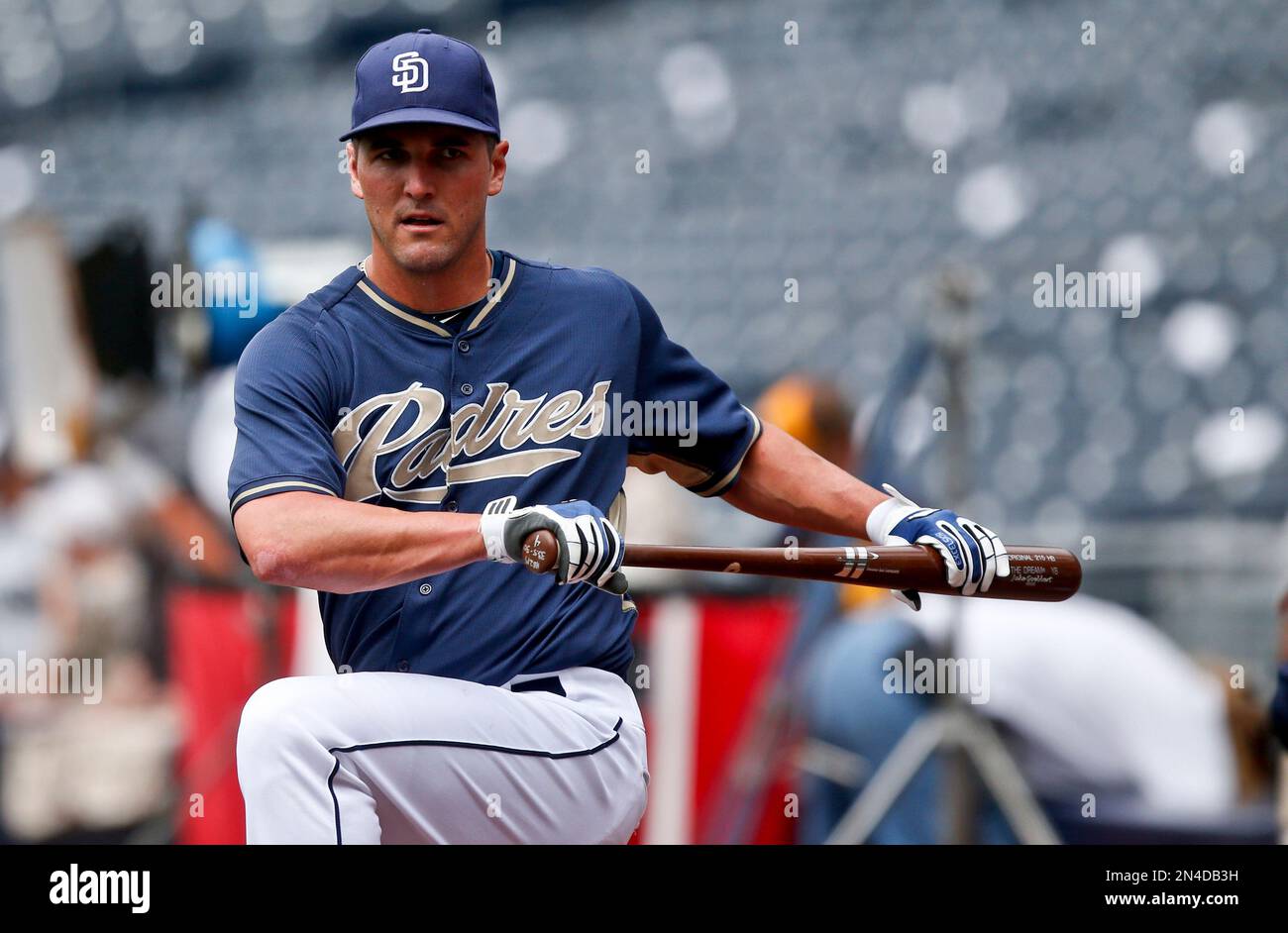 San Diego Padres first baseman Jake Goebbert gets loose before batting ...