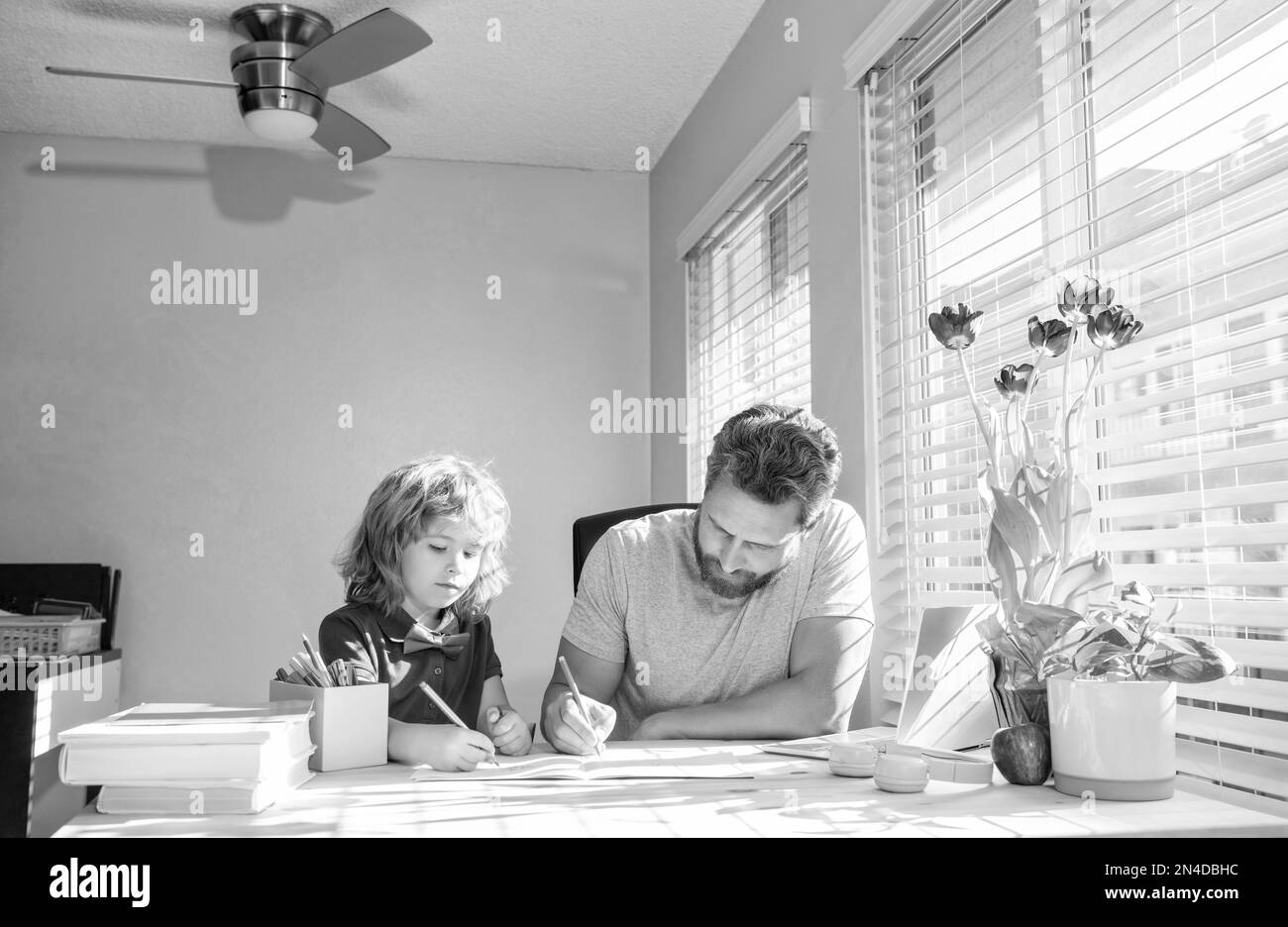 concentrated boy study with teacher. private drawing lesson. education ...