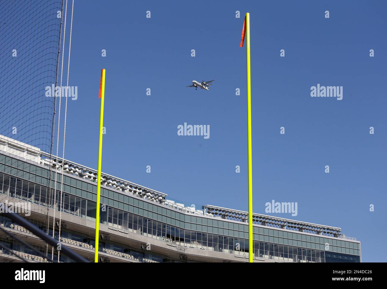 A plane flies over the press box and field on the opening day of Levi's ...