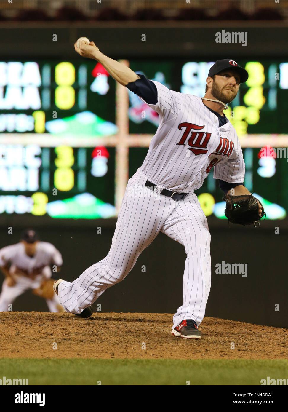Minnesota Twins pitcher Jared Burton throws against the Tampa Bay Rays ...