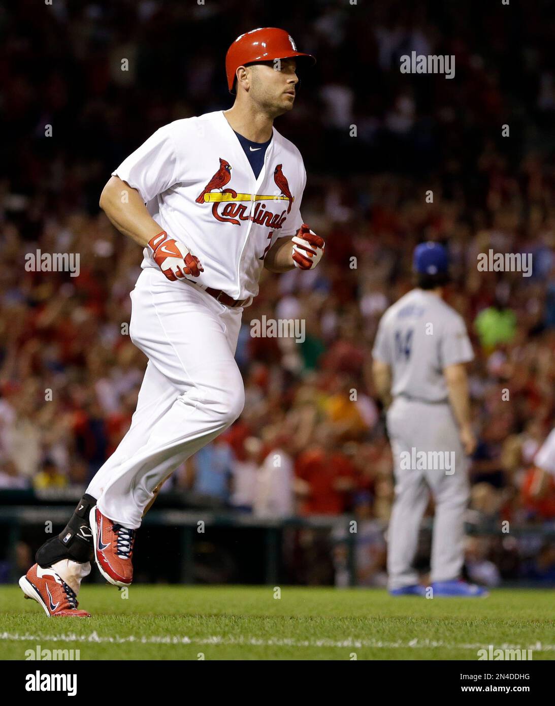 St. Louis Cardinals' Matt Holliday rounds the bases after hitting a two ...