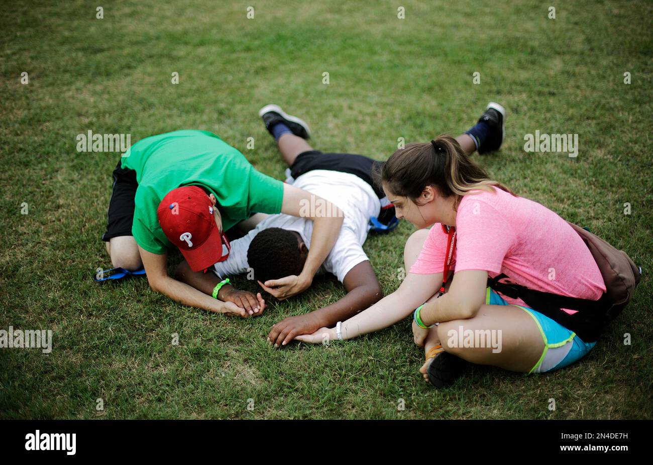In this July 15, 2014 photo, counselors Louis Centanni, 28, left, and ...