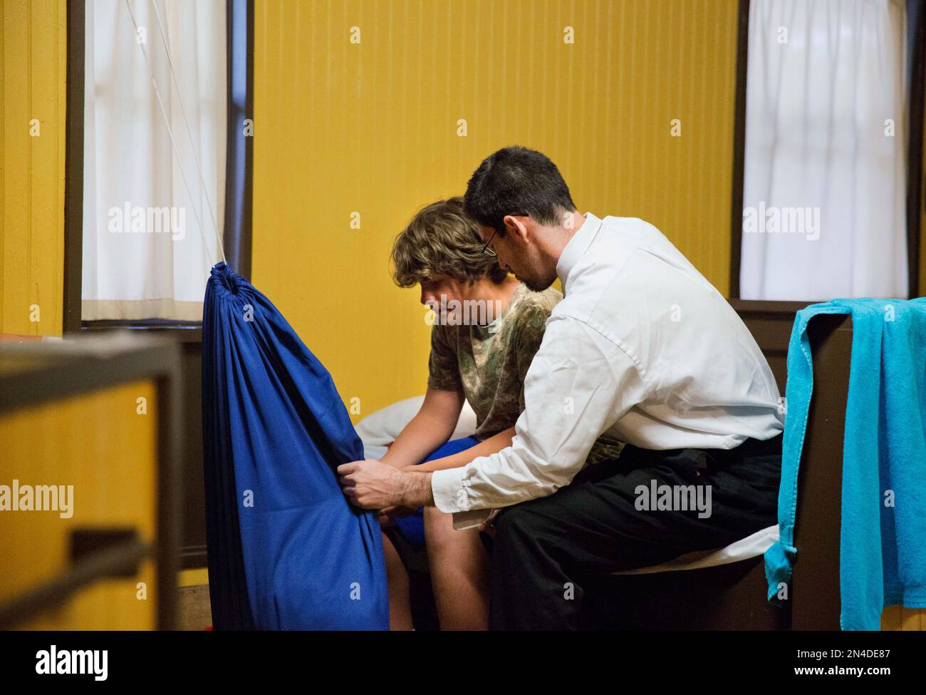 In this Thursday, July 17, 2014 photo, counselor Evan Stevens, 24, of ...