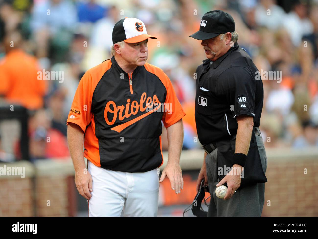 Baltimore Orioles manager Buck Showalter, left, talks with umpire Jim ...