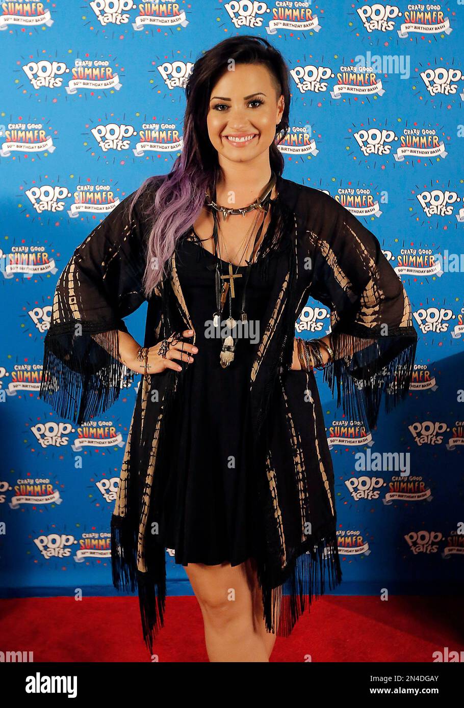 Demi Lovato poses backstage before performing at the Pop-Tarts # ...
