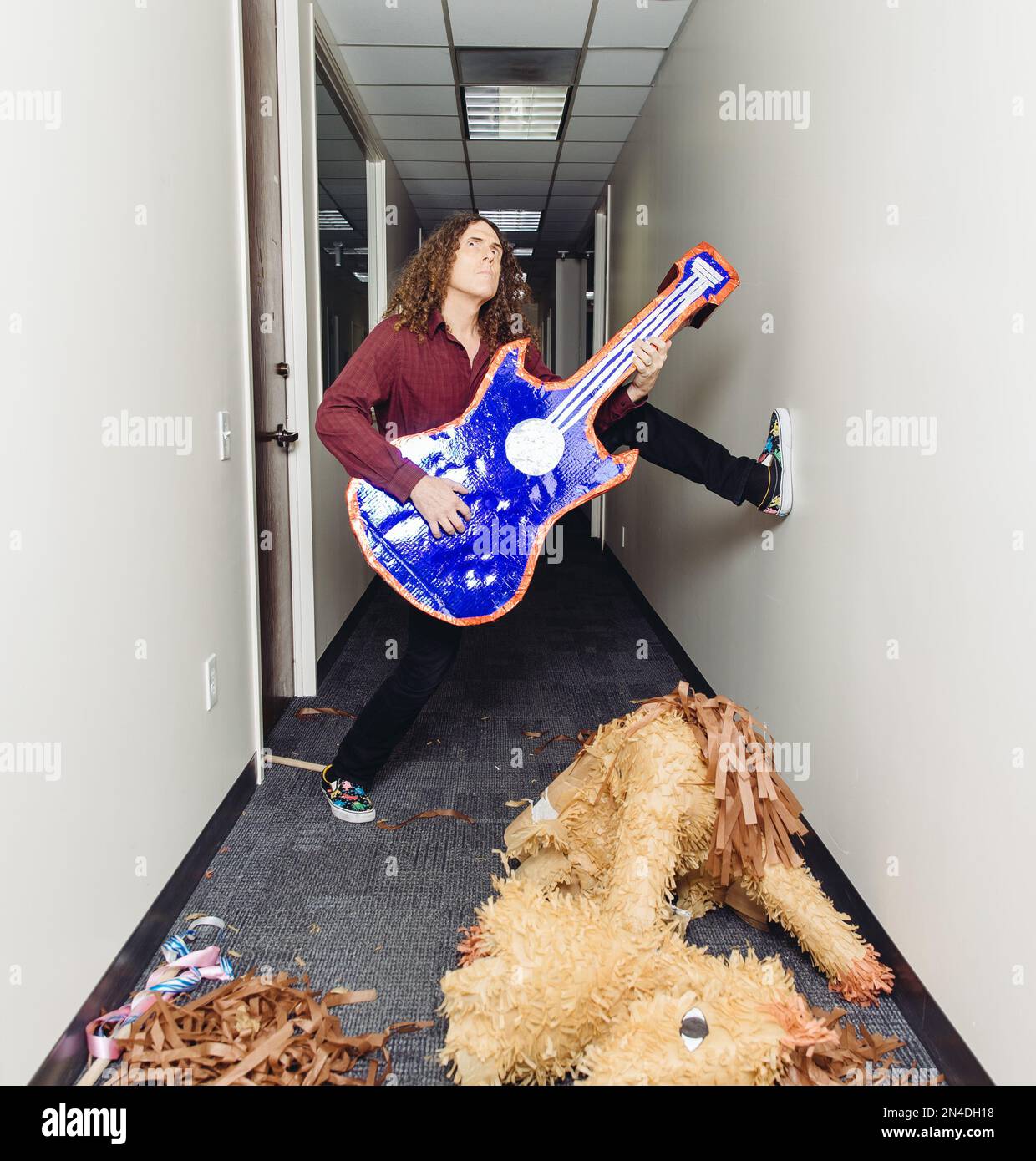 Weird Al Yankovic poses for a portrait during an interview on Thursday ...