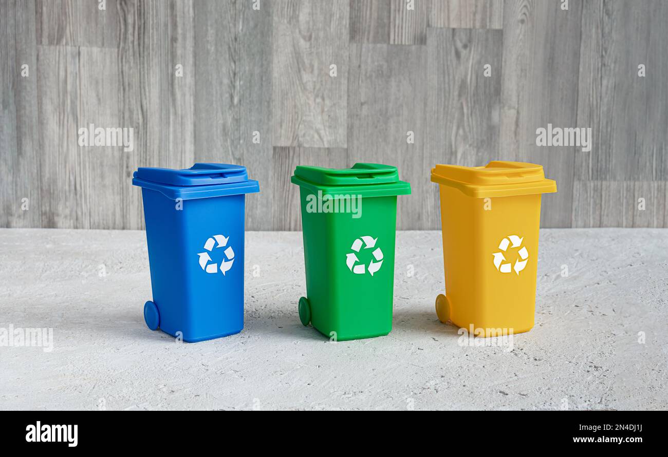 Multi-colored dustbins for organic, plastic and paper trash, waste ...
