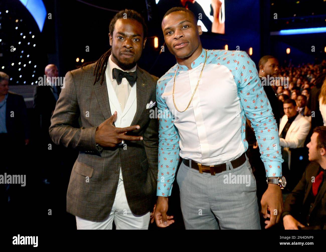 Richard Sherman, left, and Russell Westbrook pose in the audience at ...