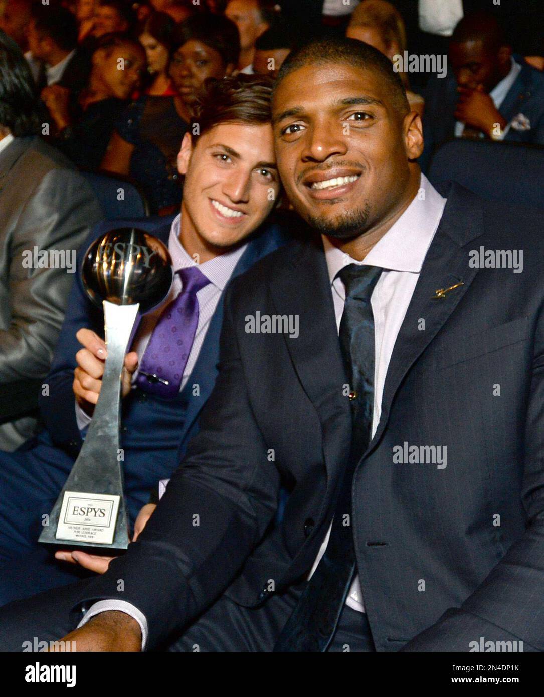 Vito Cammisano and Michael Sam pose in the audience at the ESPY Awards ...