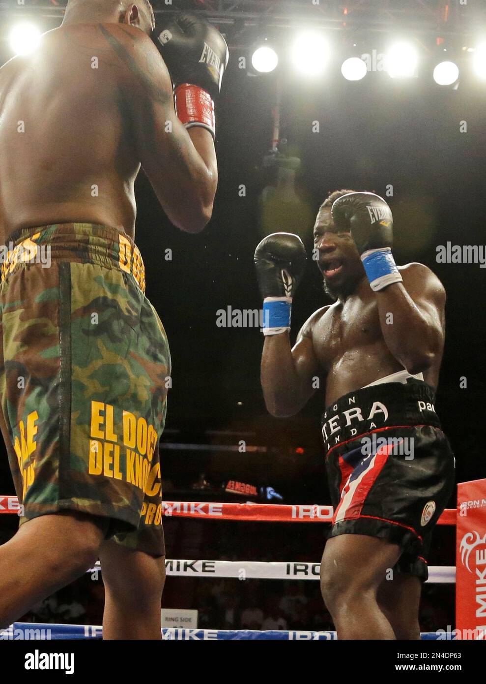 Yuniel Dorticos, left, and Edison Miranda fight during a boxing match ...