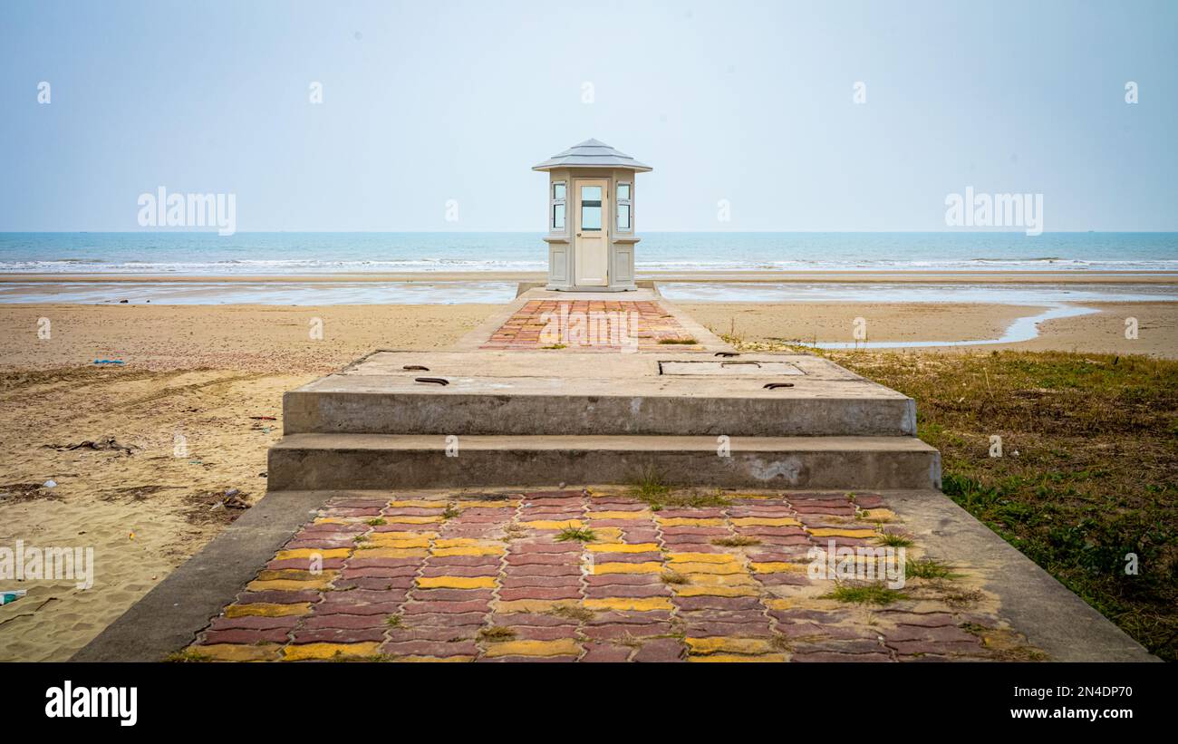 A brick pier covering a water outlet pipe at Tra Co beach near Mong Cai ...