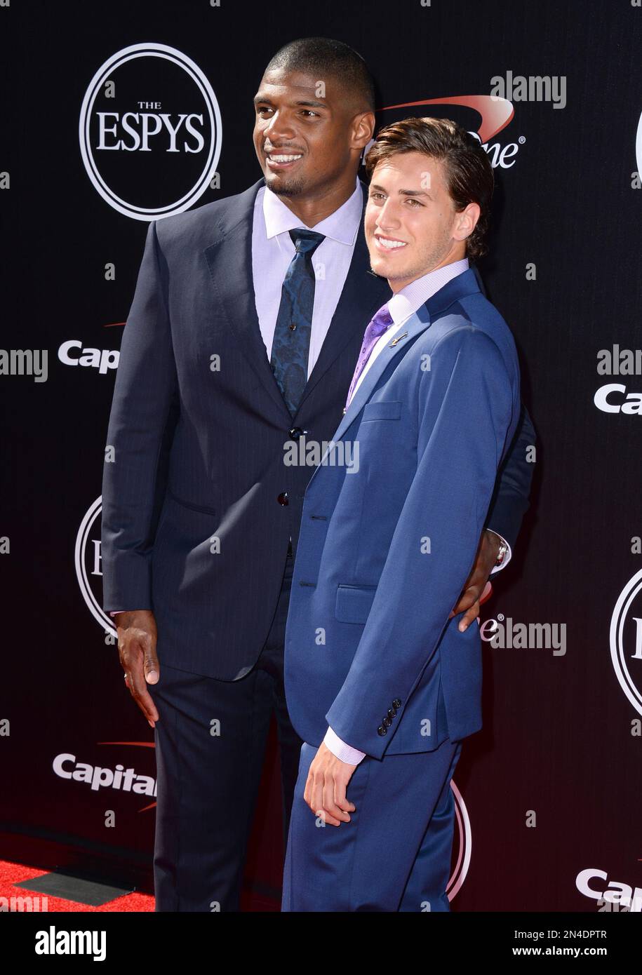 St. Louis Rams' Michael Sam, left, and Vito Cammisano arrive at the ...